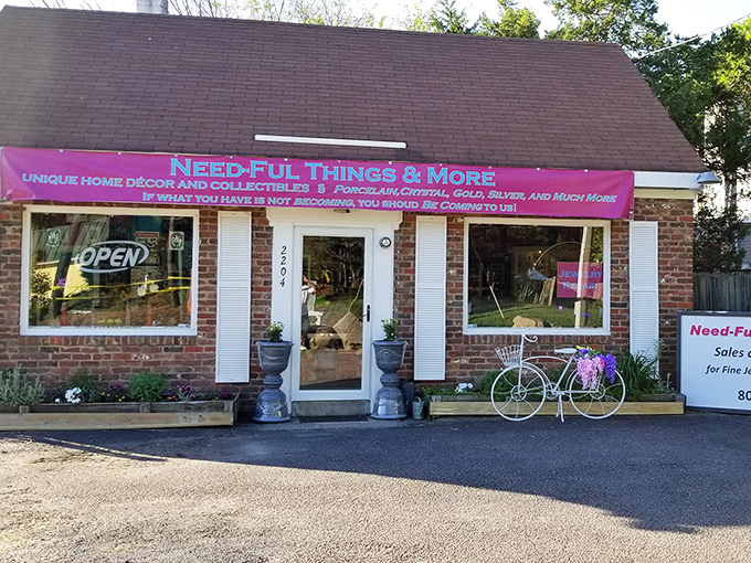 The unassuming brick exterior of Needful Things & More hides a wonderland of treasures inside, like a culinary speakeasy for vintage enthusiasts.