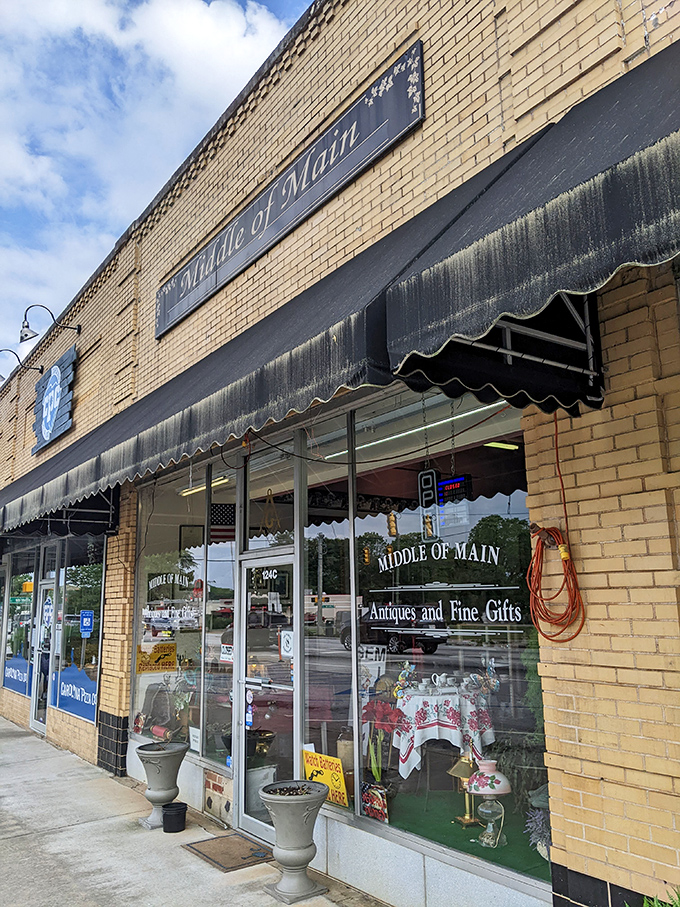 The unassuming storefront of Middle of Main beckons with its classic brick façade and that charming black bear sentinel guarding treasures within.