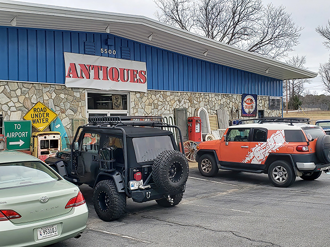 The blue facade with its bold "ANTIQUES" sign isn't just a storefront&mdash;it's a portal to decades past waiting to be explored.