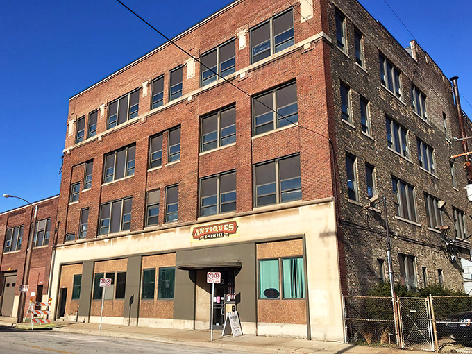 The unassuming brick exterior of Antiques on Pierce hides a wonderland of treasures inside, like a history-filled Narnia behind an industrial wardrobe.