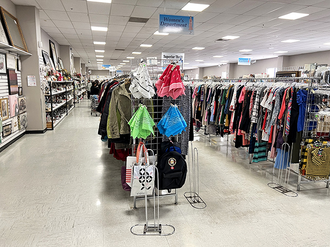 Rows of clothing stretch endlessly like a fabric rainbow where fashion dreams meet wallet-friendly reality.