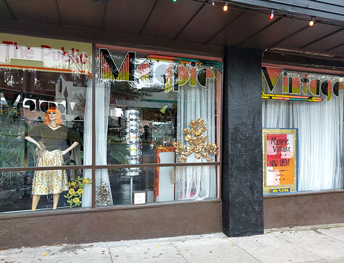 The stained-glass transom window above Magpie's entrance isn't just decoration—it's a portal to decades past, beckoning vintage hunters with its rainbow promise.