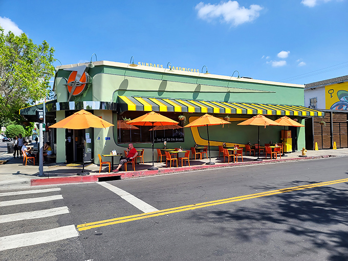 That mint-green exterior isn't just eye-catching – it's a beacon calling hungry souls home at any hour.