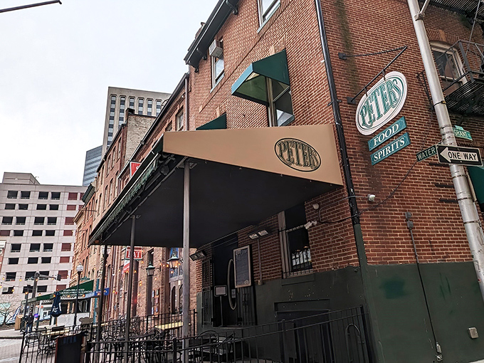 The unassuming brick facade of Peter's Pour House stands like a culinary speakeasy, promising treasures for those in the know.