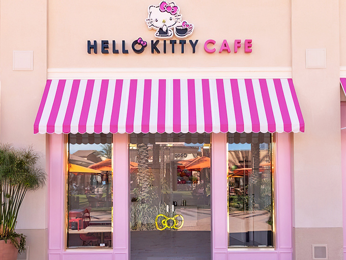 The pink palace beckons with its candy-striped awning – a portal to a world where adulthood takes a delightful vacation and your inner child gets VIP treatment.