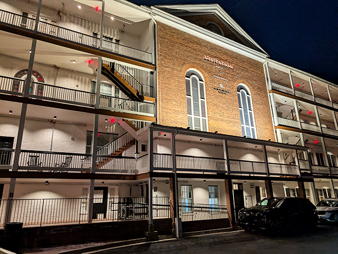 The historic brick fa&ccedil;ade of Wye Oak Tavern glows with promise at night, its multi-level balconies inviting you to step into Frederick's culinary gem.