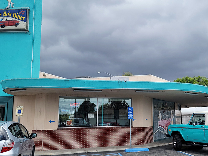 The turquoise beacon of George's 50's Diner stands out like a Cadillac in a parking lot of sensible sedans. Time travel never looked so delicious.
