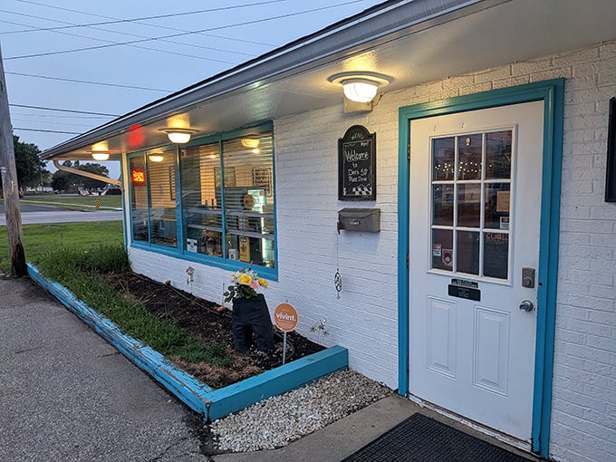 The unassuming exterior of Dee's 50's Place hides a time portal to simpler days. That turquoise trim is your first clue that nostalgia awaits inside. 