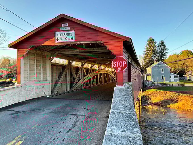 That classic red barn siding and stone foundation combo hits different when it's protecting history instead of hay.