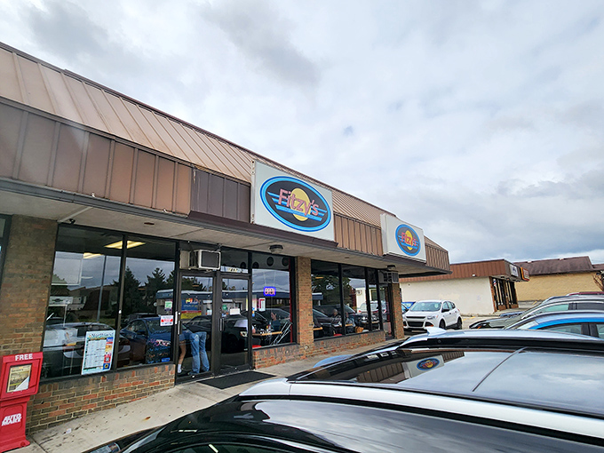 The unassuming exterior of Fitzy's belies the culinary treasures within. That blue oval sign has become a beacon for hungry Columbus locals seeking comfort food perfection.
