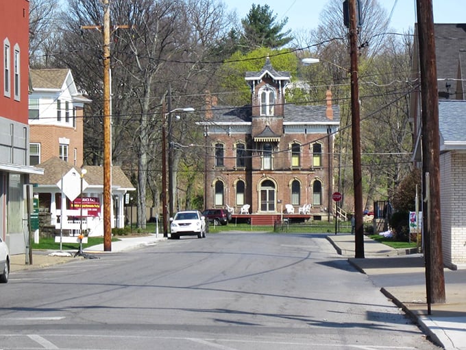 Downtown Punxsutawney's historic brick buildings stand as testaments to simpler times, when retirement meant porch-sitting and knowing your neighbors' business before they did.