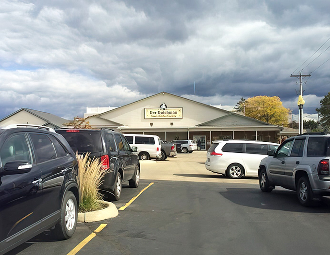 The unassuming exterior of Der Dutchman belies the culinary treasures within. Like finding a Michelin star restaurant disguised as your favorite aunt's house.