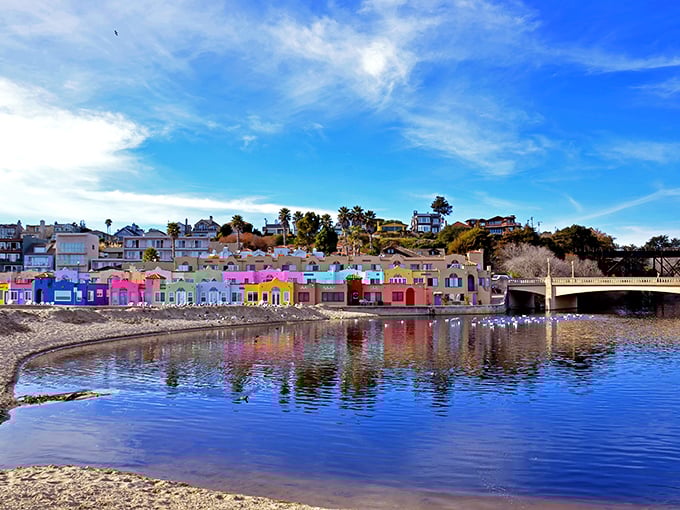 The Venetian Court's candy-colored cottages create California's answer to Portofino, their reflections doubling the visual feast along Capitola's shoreline.