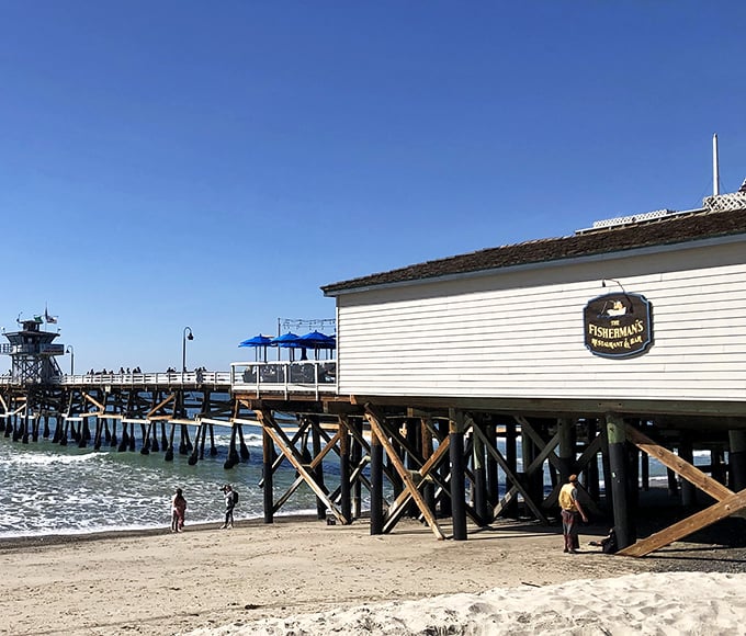 Perched majestically on San Clemente Pier, Fisherman's Restaurant is basically what heaven would look like if angels were really into fresh seafood and ocean views.