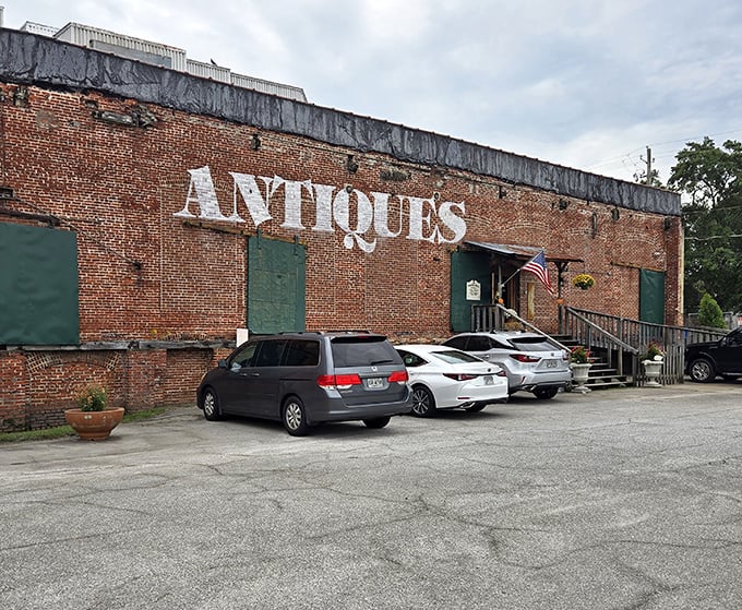The brick facade with its bold "ANTIQUES" lettering isn't just advertising&mdash;it's a siren call to treasure hunters and nostalgia seekers alike.