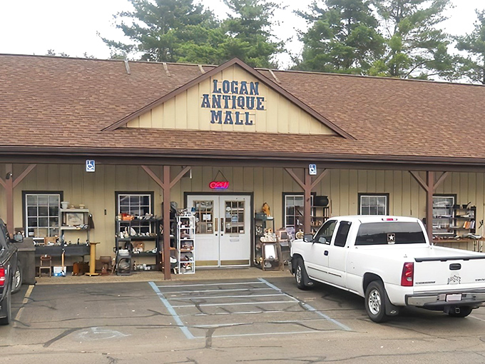 The rustic charm of Logan Antique Mall beckons from the roadside like an old friend waving you down to share stories from yesteryear.