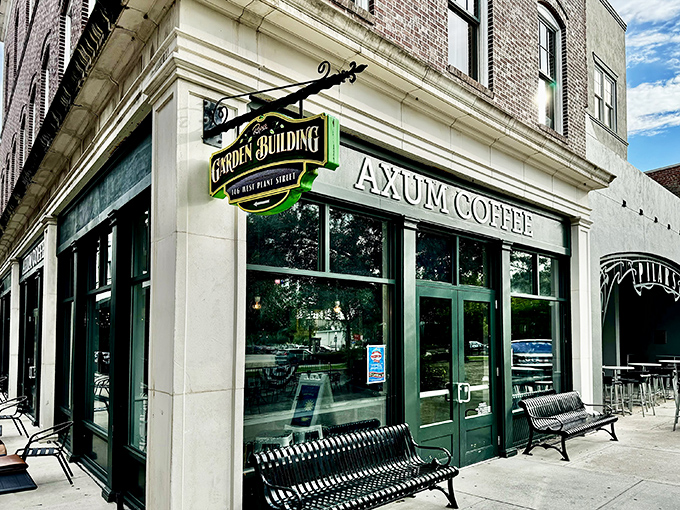 The corner storefront that launched a thousand caffeine quests. Axum Coffee's distinctive green exterior beckons like an oasis in Winter Garden's historic district.