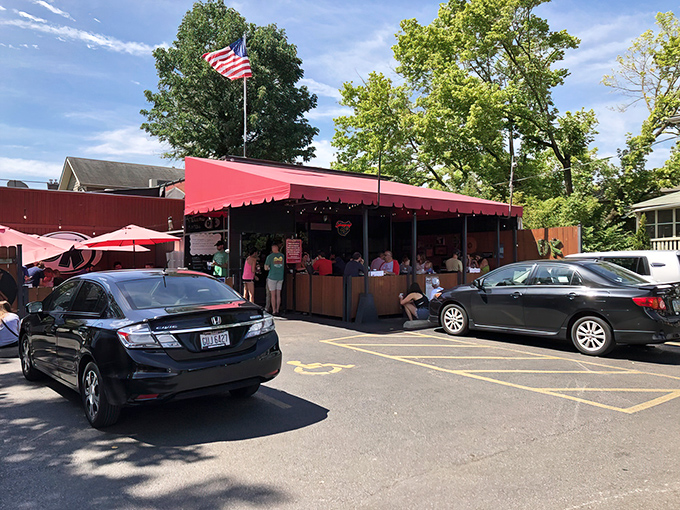 The red awning of DK Diner stands like a breakfast beacon in Grandview Heights, where morning warriors gather for their daily sustenance.