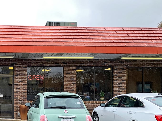 That iconic red roof and brick exterior isn't trying to be fancy&mdash;and that's precisely its charm. A beacon for hungry travelers since long before Instagram food pics were a thing.