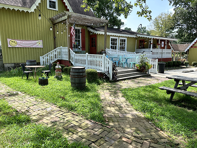 The storybook green cottage with its white picket fence isn't just charming&mdash;it's practically begging you to come in and loosen your belt a notch.