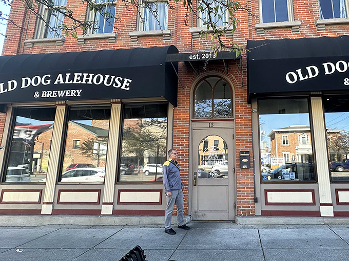 The classic brick fa&ccedil;ade of Old Dog Alehouse & Brewery beckons like an old friend with a new secret to share. Those black awnings aren't just stylish&mdash;they're practically winking at you.