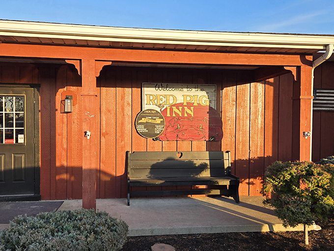 The Red Pig Inn's barn-red exterior isn't just a color choice&mdash;it's a promise of the smoky treasures waiting inside this unassuming Ottawa landmark.