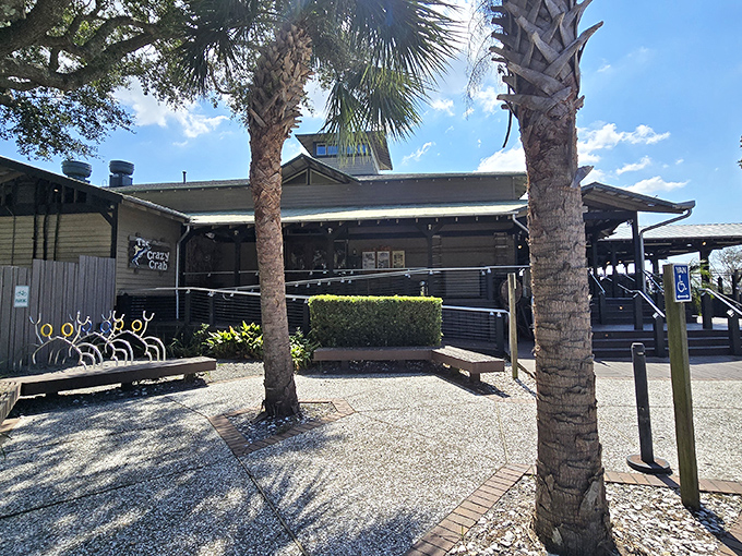 The weathered wooden exterior of The Crazy Crab beckons like an old friend, promising seafood treasures inside this Hilton Head Island landmark.