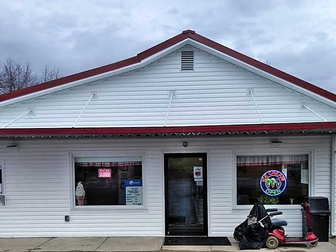 The unassuming white clapboard building with its cheerful red roof stands like a time capsule of Americana, promising sweet relief from Ohio summers.