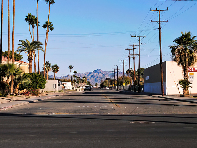 Main Street Blythe serves up that classic desert town vibe with a side of mountain majesty. Those palm trees aren't just for show &ndash; they're nature's exclamation points.