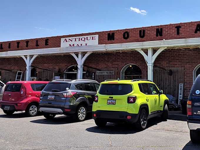 The charming brick exterior with white columns isn't just inviting&mdash;it's practically winking at you to come discover what treasures await inside.