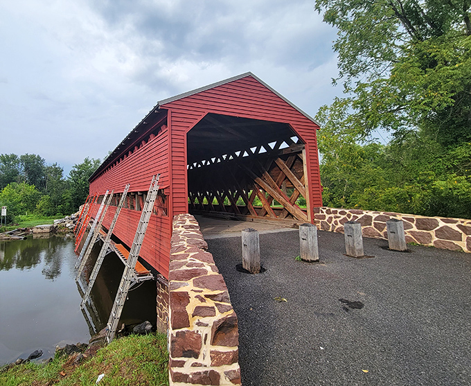 The crimson hue of Sachs Covered Bridge against Pennsylvania's greenery creates a postcard-perfect scene that no Instagram filter could improve upon.