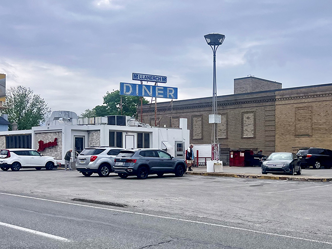 The neon glow of Llanerch Diner's iconic sign transforms an ordinary night into a Edward Hopper painting come to life. Classic Americana at its finest.