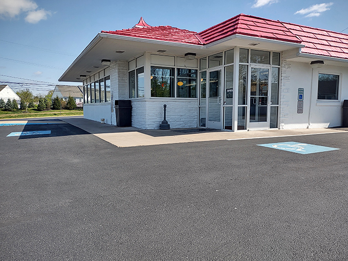The iconic red roof of Speck's Drive-In stands as a beacon of comfort food in Collegeville, a time capsule of Americana serving deliciousness since before trendy was trendy.