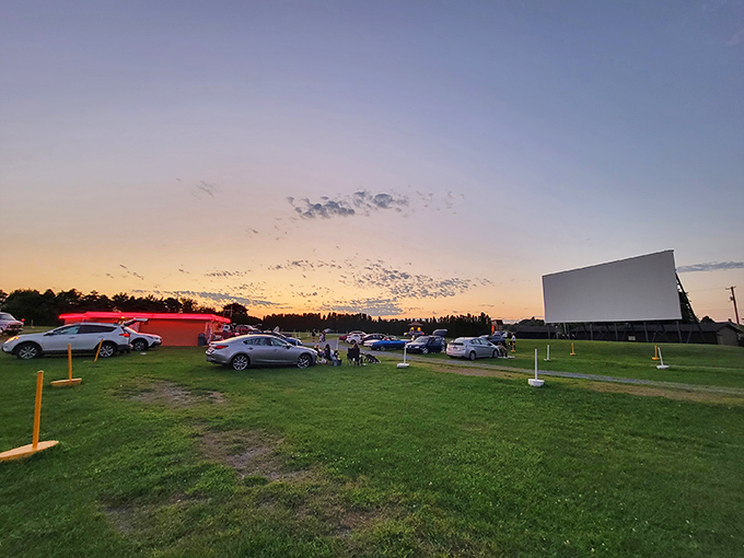 Twilight magic unfolds as cars gather beneath Pennsylvania's oldest continuously operating silver screen. Cinema under the stars never gets old.