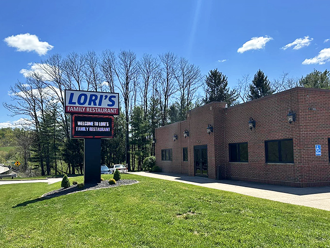 The brick fortress of flavor announces itself with a bold blue sign. Lori's stands ready to welcome hungry travelers into its comfort food kingdom.