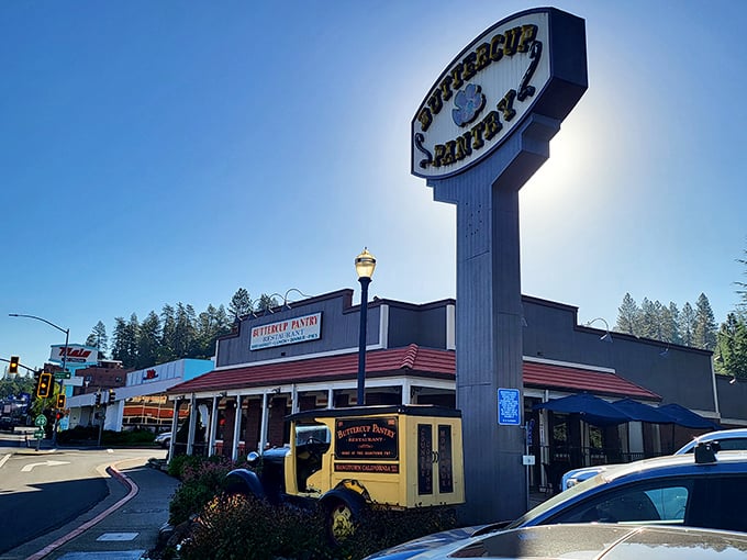 The iconic Buttercup Pantry sign stands tall against the California sky, like a lighthouse guiding hungry travelers to breakfast paradise.