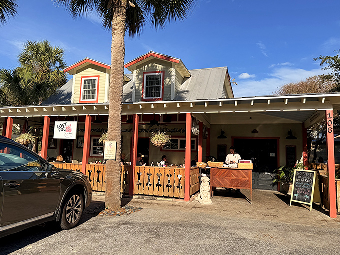 The cheerful yellow exterior with red trim practically shouts "happiness served here!" Palm trees and that iconic wooden fence welcome you to breakfast paradise.