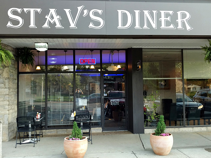The modest stone façade of Stav's Diner hides Columbus's breakfast holy grail. That glowing "OPEN" sign might as well say "PARADISE FOUND."