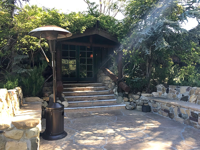 Stone steps and rustic charm welcome you to this mountain hideaway where culinary magic awaits. 