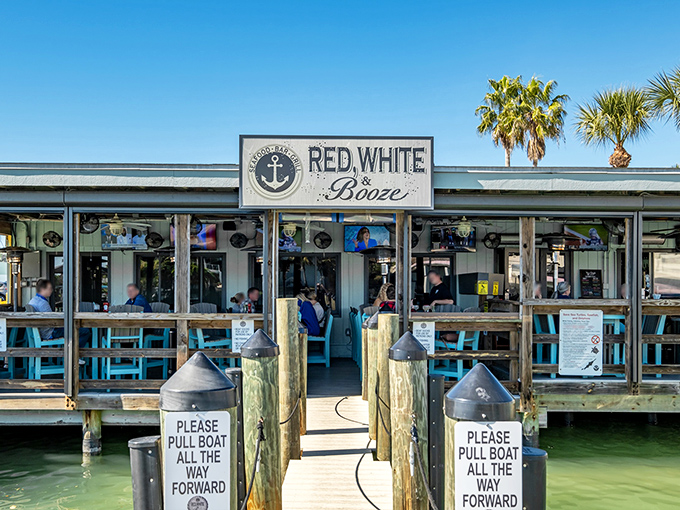 The nautical welcome wagon! Red, White & Booze beckons seafood lovers with its waterfront charm and those unmistakable "please pull boat forward" signs that scream "Florida dining done right."