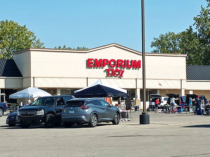 The red letters of Emporium 1101 beckon like a lighthouse for bargain hunters. This unassuming exterior hides a treasure trove that would make Indiana Jones reconsider his career path.