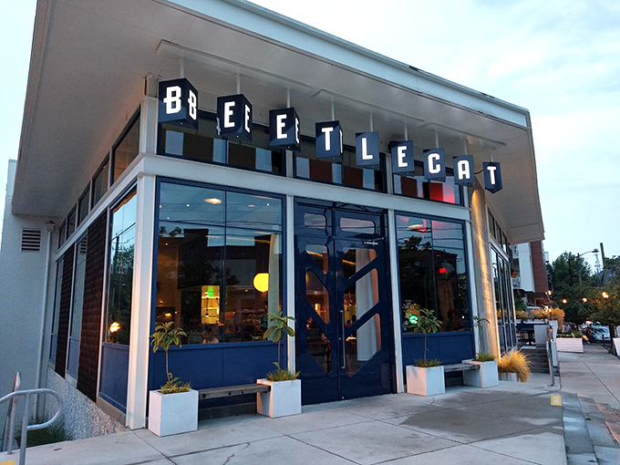 BeetleCat's striking blue exterior stands out in Inman Park like a maritime beacon, promising seafood treasures within its nautical-inspired walls.