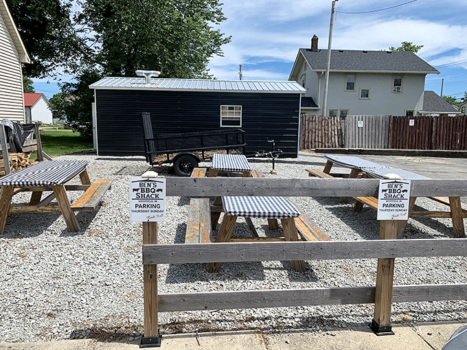 The little white brick house with the red door isn't just charming&mdash;it's BBQ headquarters. That "BBQ y'all" sign is basically Indiana's version of the pearly gates.