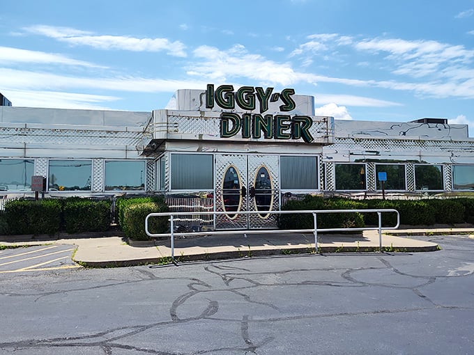 The gleaming silver exterior of Iggy's Diner beckons from Route 66 like a time machine disguised as a lunch counter. Pure Americana awaits.
