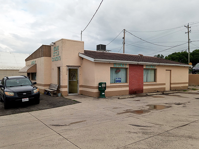 The unassuming exterior of Midway Restaurant stands like a culinary sentinel on West Franklin Street, promising honest food without pretense.