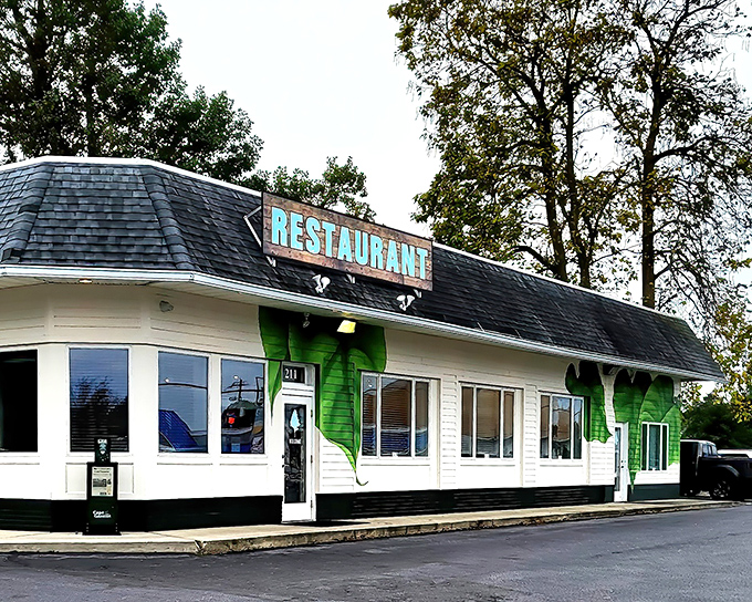 The unassuming exterior of The Backyard in Milton might fool you, but that green vine detail hints at the fresh culinary adventures waiting inside.