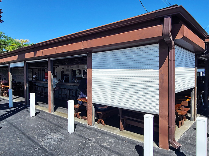 No architectural awards here, just decades of smoke-infused magic. This unassuming brown structure houses Florida seafood dreams that fancy restaurants can only imitate.