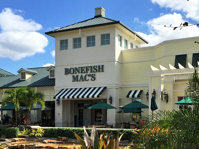 Waterfront dining that doesn't require a yacht club membership. Bonefish Mac's coastal charm welcomes you with turquoise umbrellas and a serene water feature.