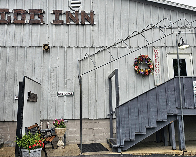 The unassuming white clapboard exterior of The Log Inn hides a culinary time machine. History and ham steaks await behind those doors!