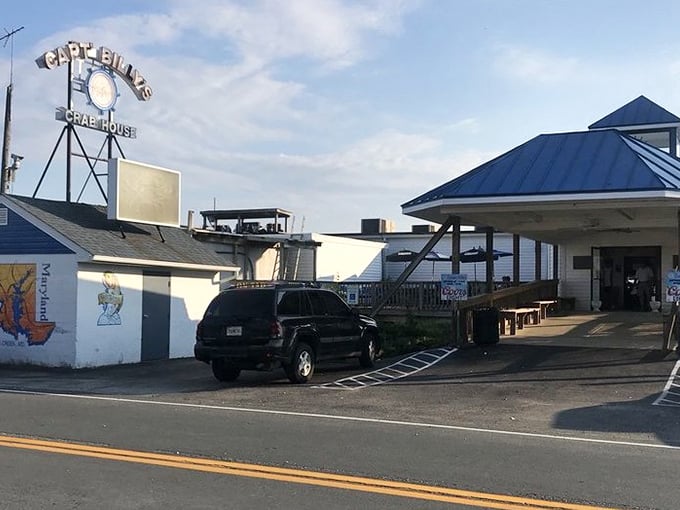 The iconic roadside sign beckons like a siren call to seafood lovers &ndash; Captain Billy's stands ready to welcome hungry travelers to crab paradise.